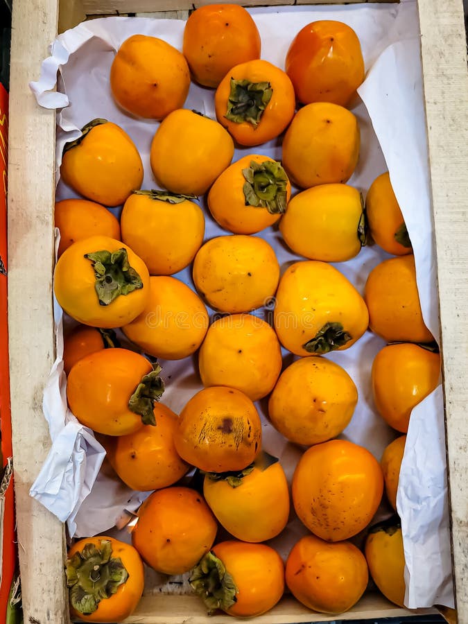 Fresh Persimmon Fruits are in a Box in the Store Stock Photo - Image of ...