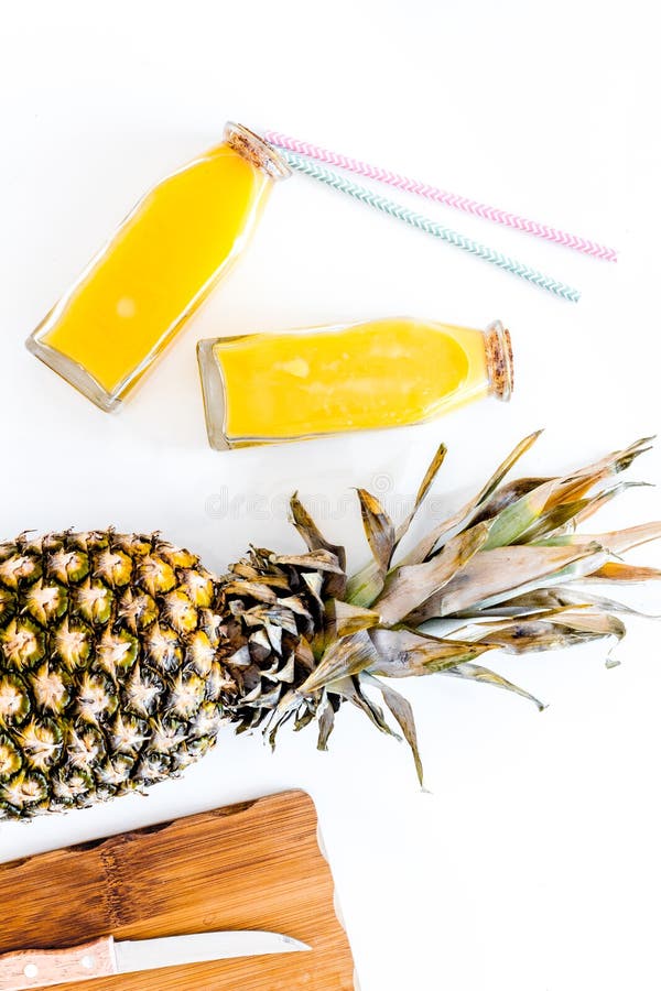 Fresh Pineapple Juice in Bottle on White Background Top View Stock ...