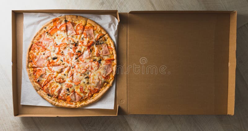 Fresh pizza in a box stock image. Image of view, mushrooms - 93191565