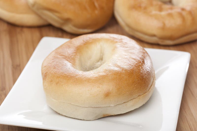 A fresh plain bagel stock image. Image of baked, wheat - 20198431