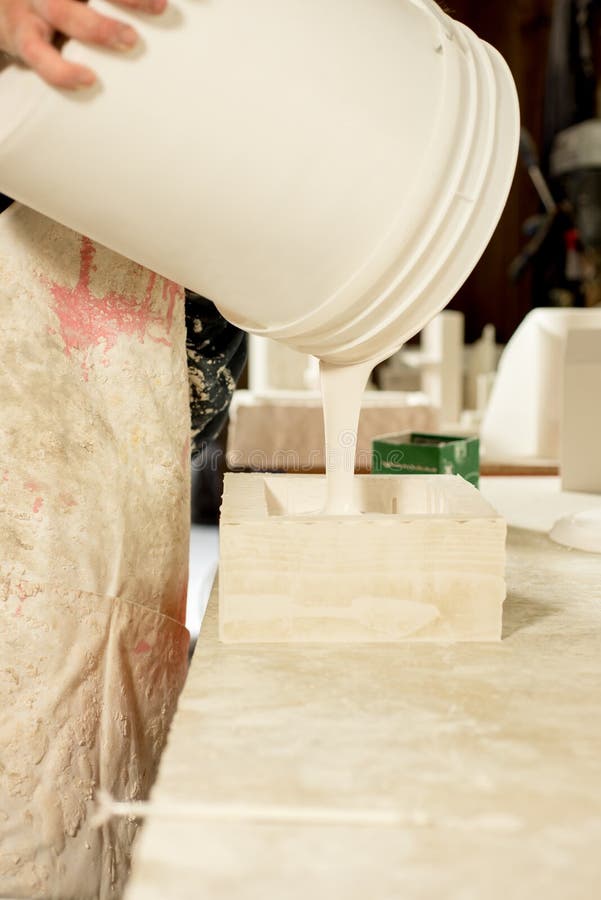 Fresh Plaster Poured Onto a Small Mold Stock Photo - Image of gypsum ...
