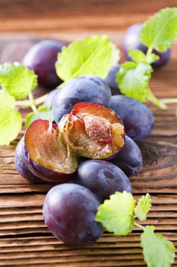 Fresh plums stock photo. Image of table, green, fresh - 21031966