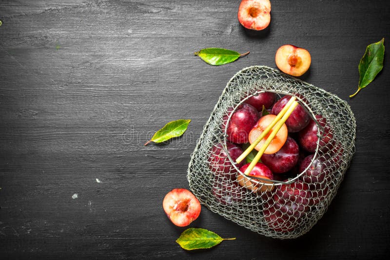 Fresh Plums with a Mesh Bag. Stock Photo - Image of diet, blue: 109116362