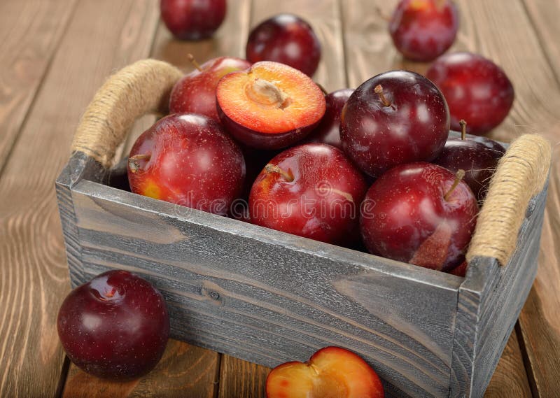 Fresh Plums in a Wooden Box Stock Photo - Image of edible, cooking ...