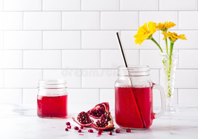 Fresh Pomegranate Juice on a Marble Surface with Copy Space Stock Photo ...