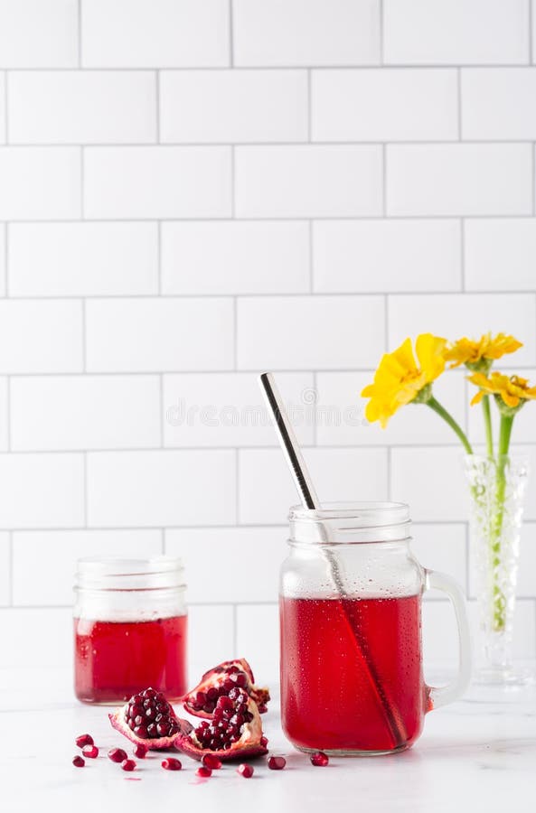 Fresh Pomegranate Juice on a Marble Surface with Copy Space Stock Photo ...
