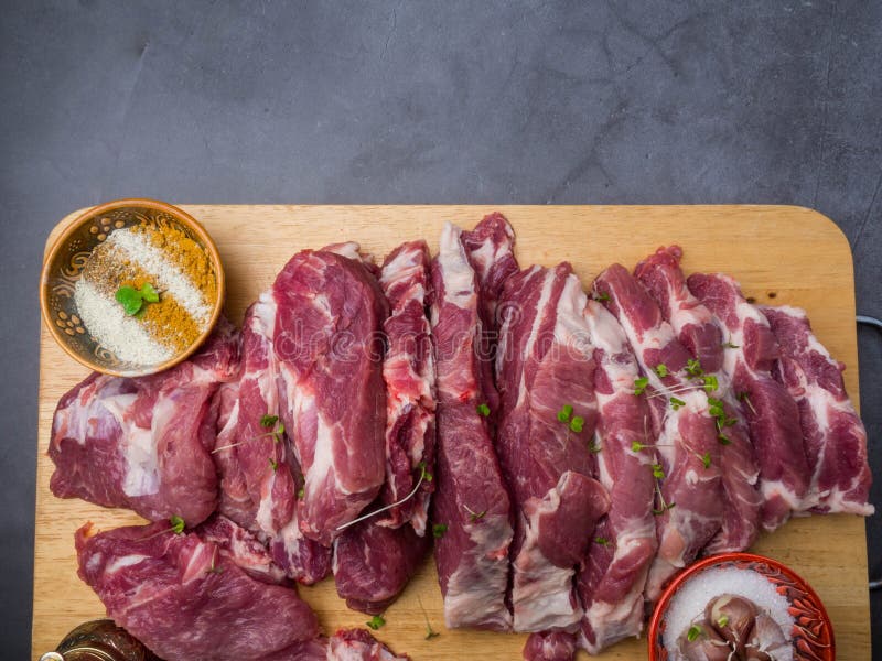 Fresh Pork with Ingredients for Cooking on Dark Background Stock Image ...