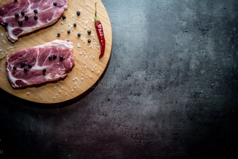 Fresh Pork Meat. Place for Text. Stock Image - Image of garlic, black ...