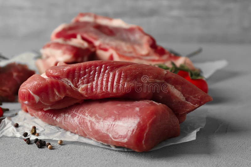 Fresh Pork Tenderloin on Grey Table Stock Image - Image of pork, table ...