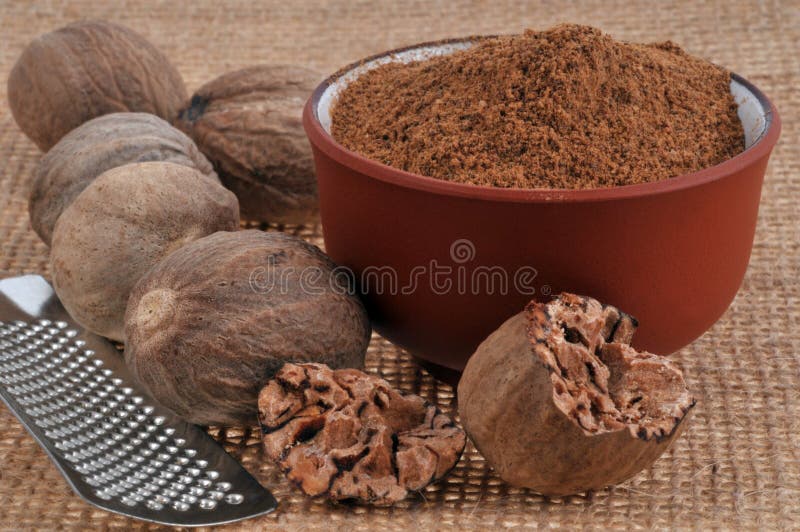 Nutmeg Fresh and Powdered with a Grated Stock Image - Image of ...