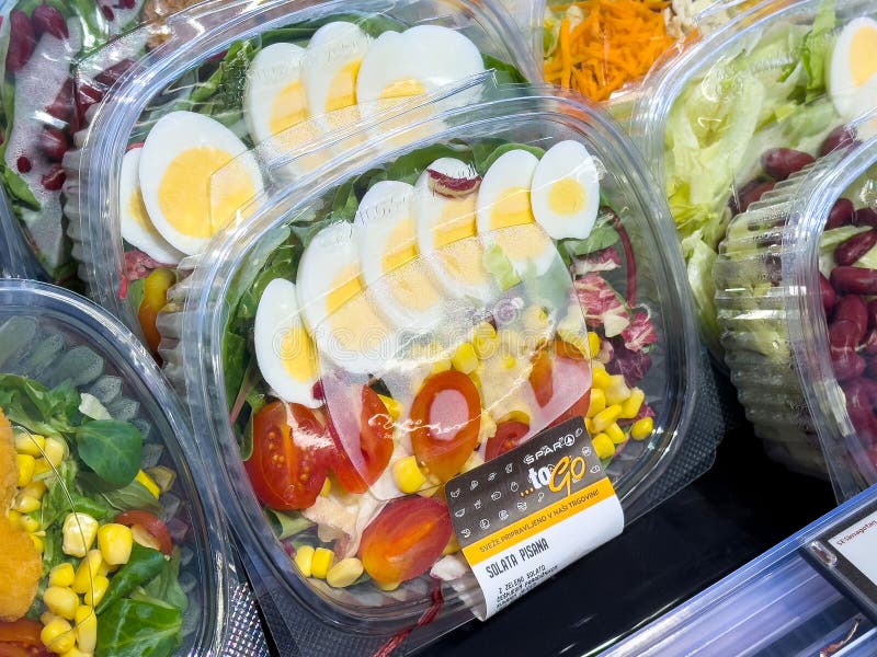 Fresh Prepackaged Salad with Sliced Egg, Corn, and Cherry Tomatoes in ...