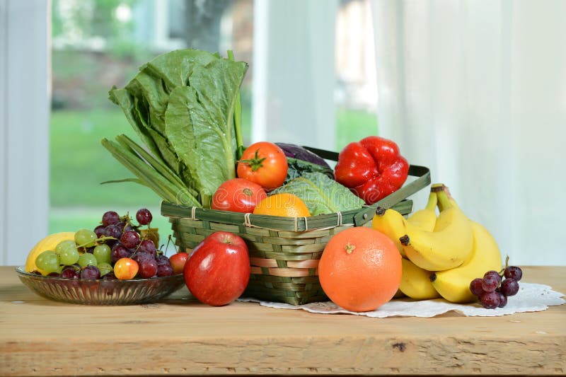 Fresh Produce and Basket on Table Stock Photo - Image of grapes, yellow ...