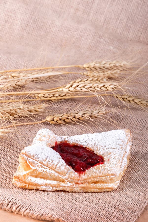 Fresh Puff Pastry with Powdered Sugar with Jam and Cream Stock Photo ...