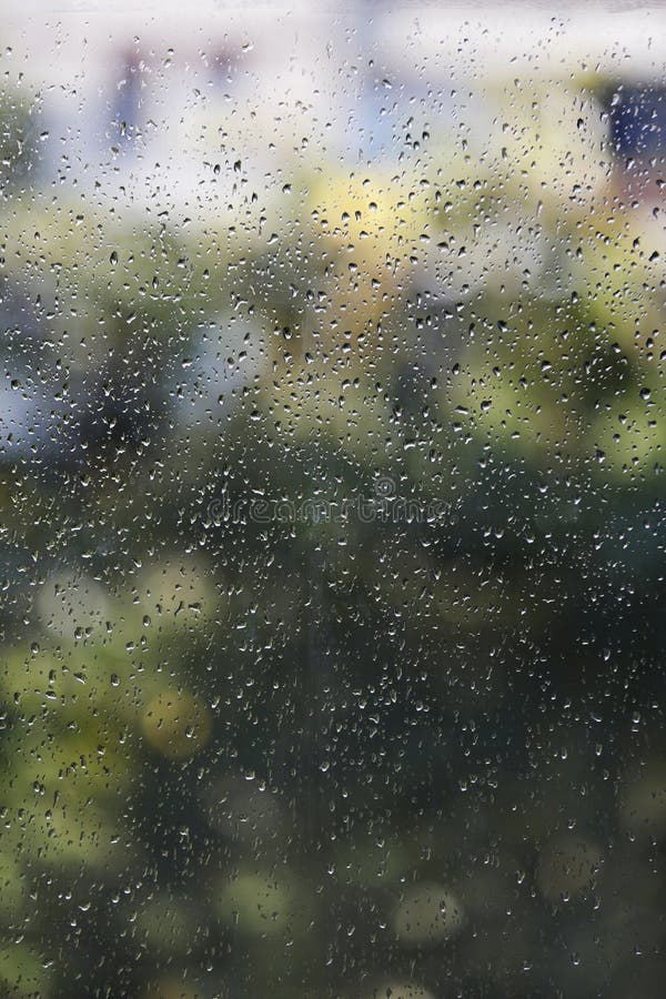 Fresh Rain Splash Drops on a Window with Background Nature in Bl Stock ...
