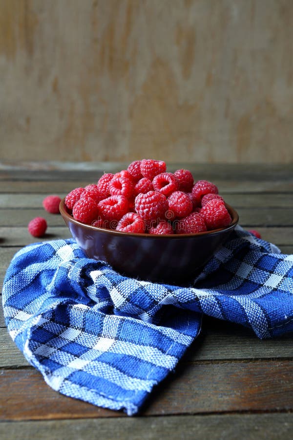 Fresh Raspberries in a Bowl on the Table Stock Photo - Image of food ...