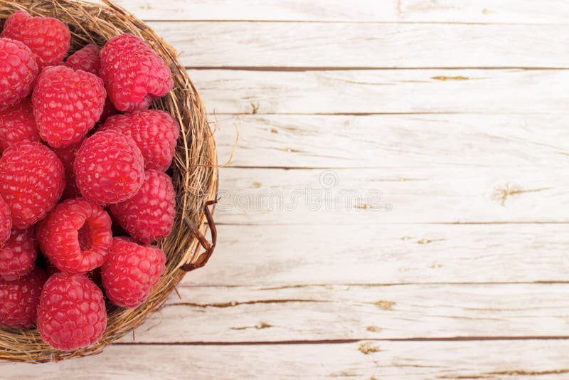 Fresh Raspberry in a Basket on Table Stock Image - Image of bunch ...
