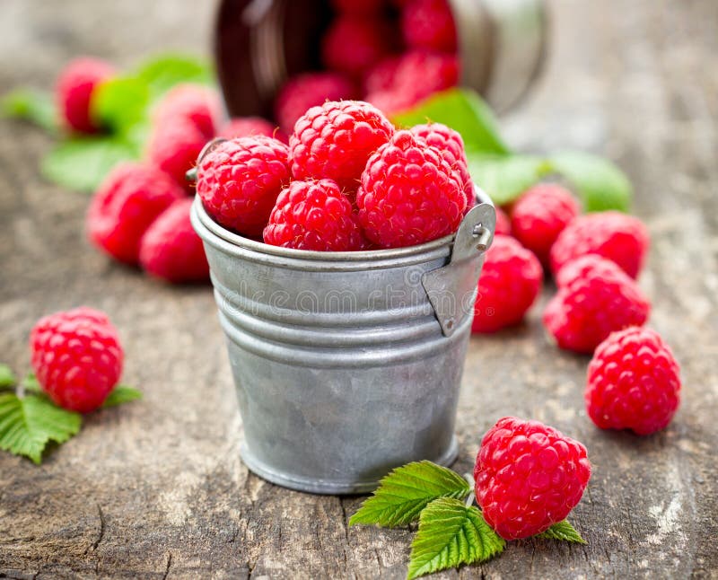 Fresh Raspberry in the Bucket Stock Photo - Image of fruit, wood: 38575764