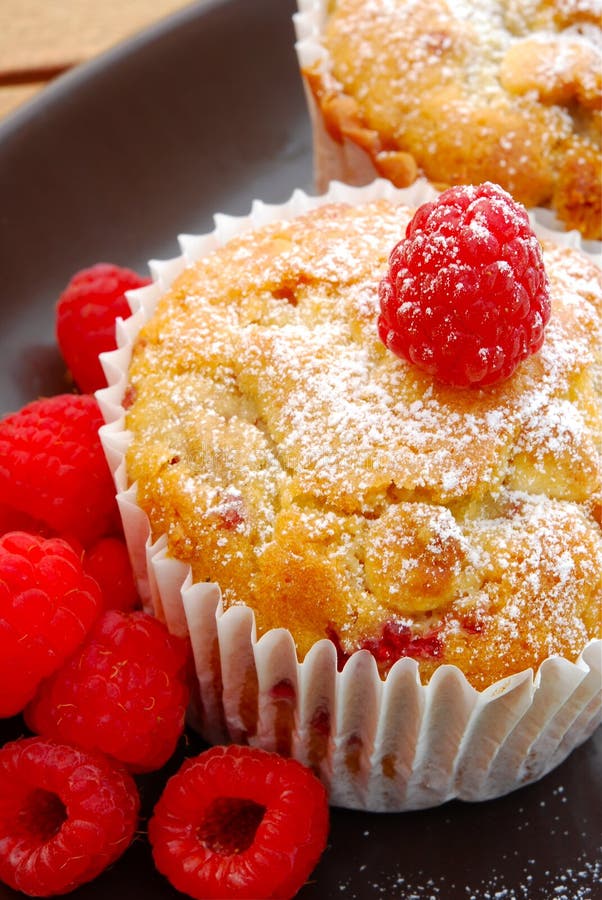 Fresh Raspberry Muffins on Plate Stock Photo - Image of gourmet, muffin ...