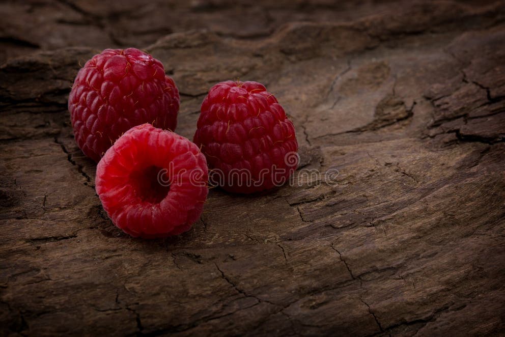 Fresh Raspberry in a Wooden Plate Stock Photo - Image of blue, food ...
