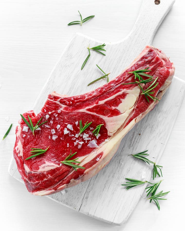 Fresh Raw Beef Bone Rib Roughly Choppid on White Board with Herbs Stock ...