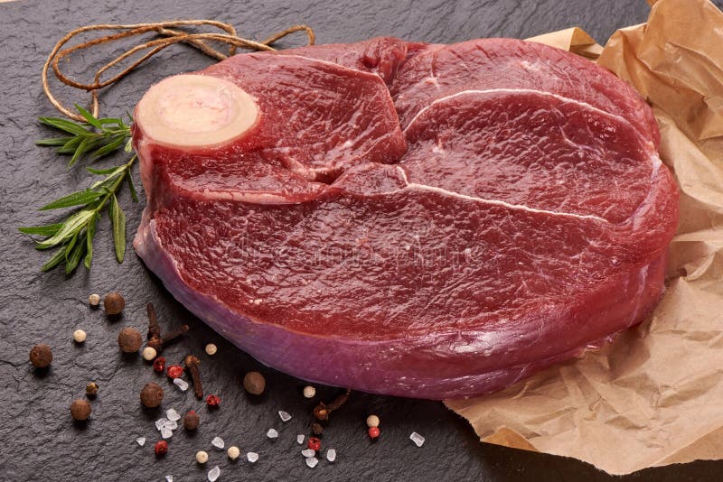 Fresh Raw Beef Meat with Bone for Steak on Stone Plate Stock Image ...