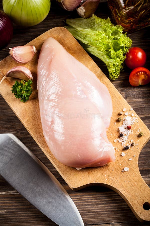 Fresh raw chicken breasts stock photo. Image of food - 79791324