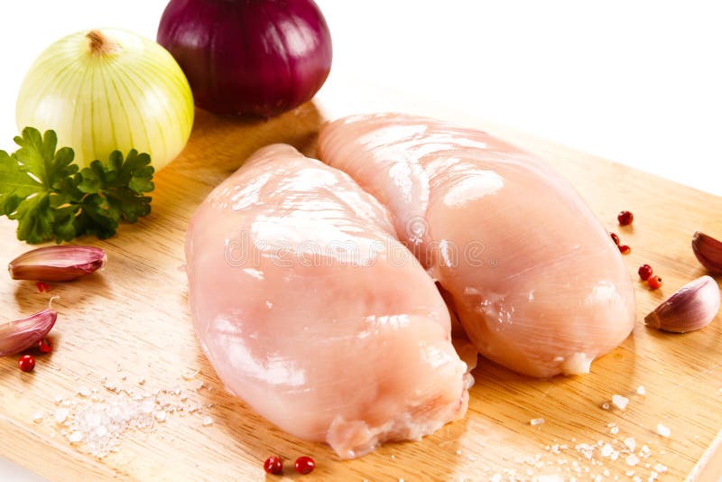 Fresh raw chicken breasts stock image. Image of dinner - 82236263