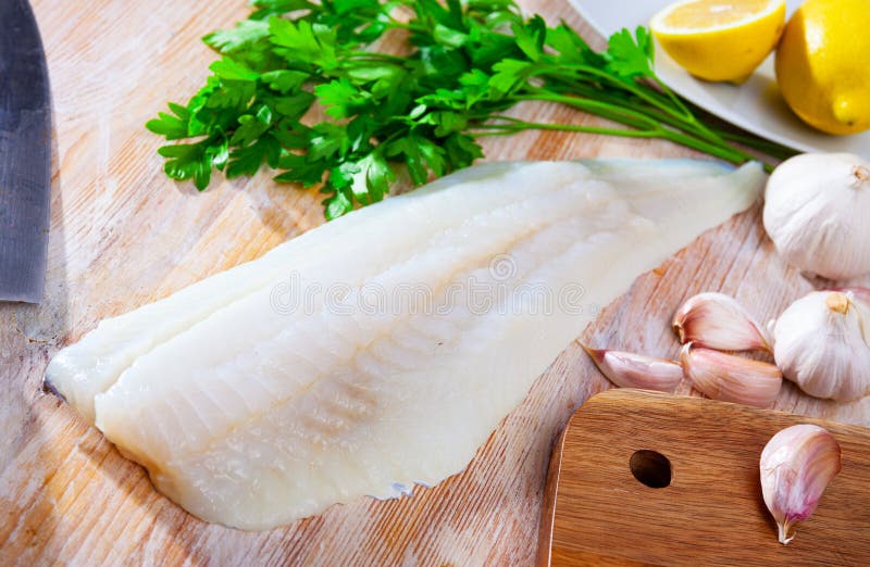 Raw Cod Fillet with Greens and Spices Stock Photo - Image of tomcod ...
