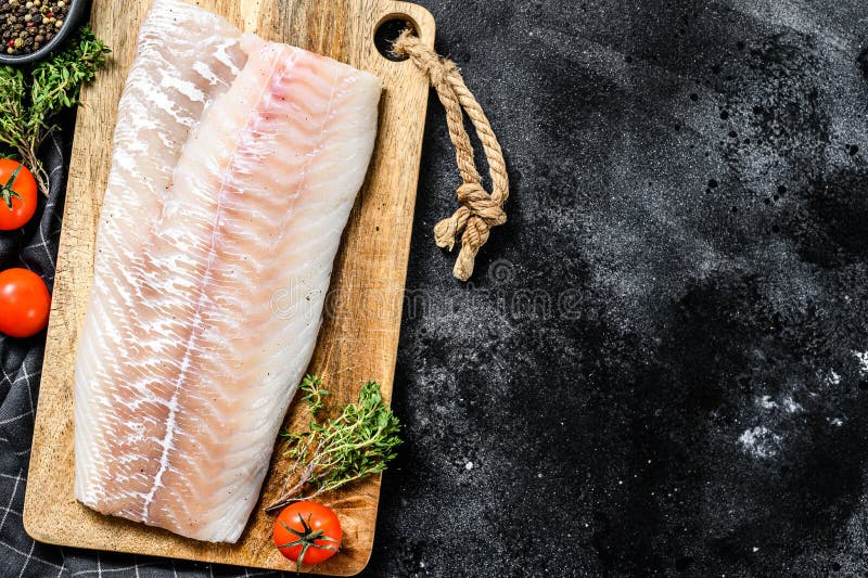 Fresh Raw Cod Loin Fillet with Thyme. Black Background. Top View Stock ...