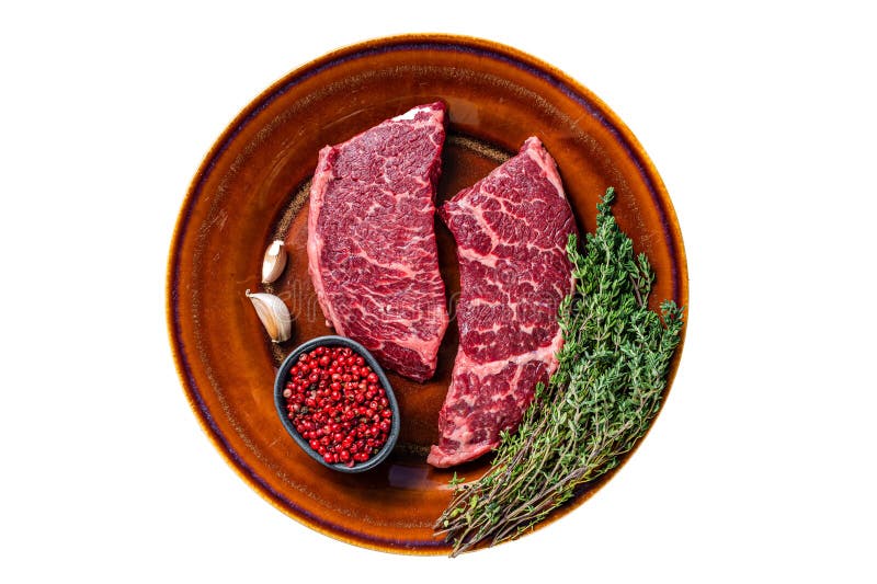 Fresh Raw Denver or Top Blade Meat Steak on a Rustic Plate with Thyme ...