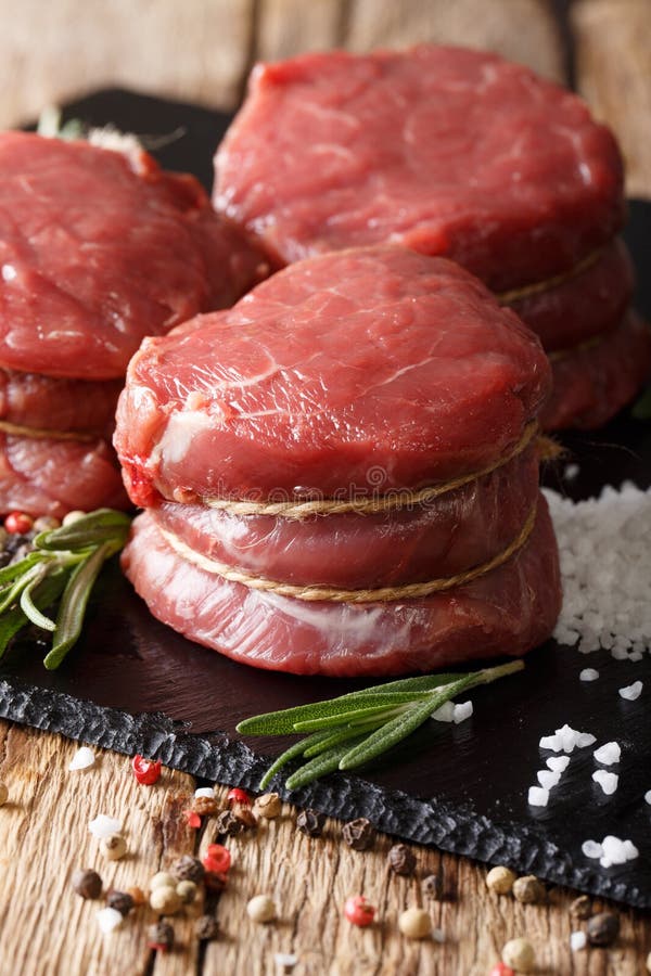 Fresh Raw Filet Mignon Steak with Ingredients Macro. Vertical Stock ...