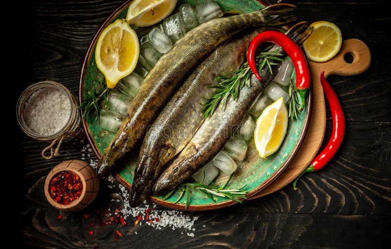 Fresh Raw Fish and Food Ingredients on Table. Food Background Stock ...