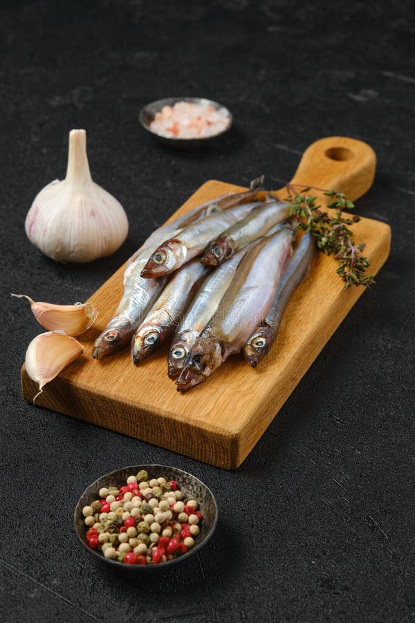 Fresh raw frozen capelin stock image. Image of omega - 246896703