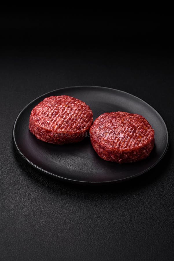 Fresh Raw Ground Beef Burger Patty with Salt and Spices Stock Image ...