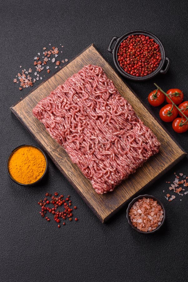 Fresh Raw Ground Minced Beef with Salt and Spices Stock Photo - Image ...