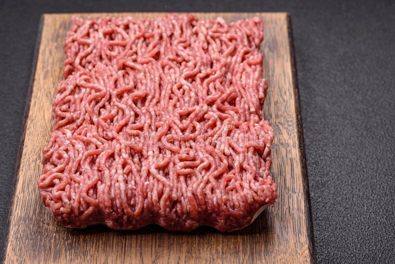 Fresh Raw Ground Minced Beef with Salt and Spices Stock Photo - Image ...