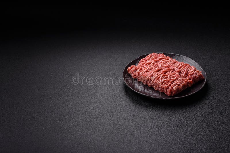Fresh Raw Ground Minced Beef with Salt and Spices Stock Photo - Image ...