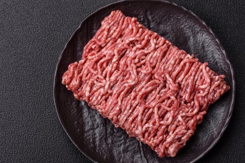 Fresh Raw Ground Minced Beef with Salt and Spices Stock Image - Image ...