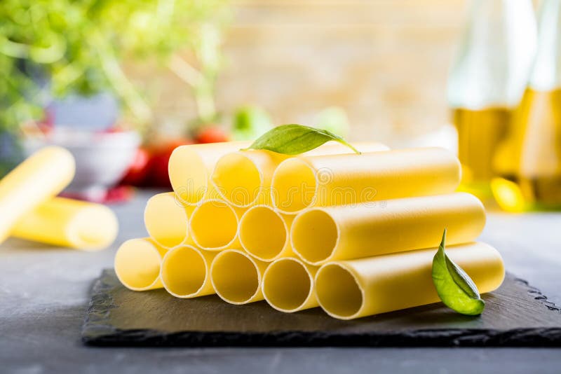 Fresh Raw Homemade Connelloni PASTA on Dark Table. Stock Image - Image ...