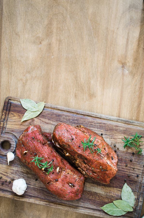 Fresh Raw Marinated Meat on a Wooden Table. Stock Photo - Image of ...
