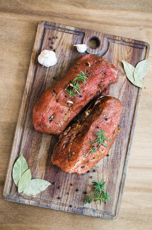 Fresh Raw Marinated Meat on a Wooden Table. Stock Image - Image of ...