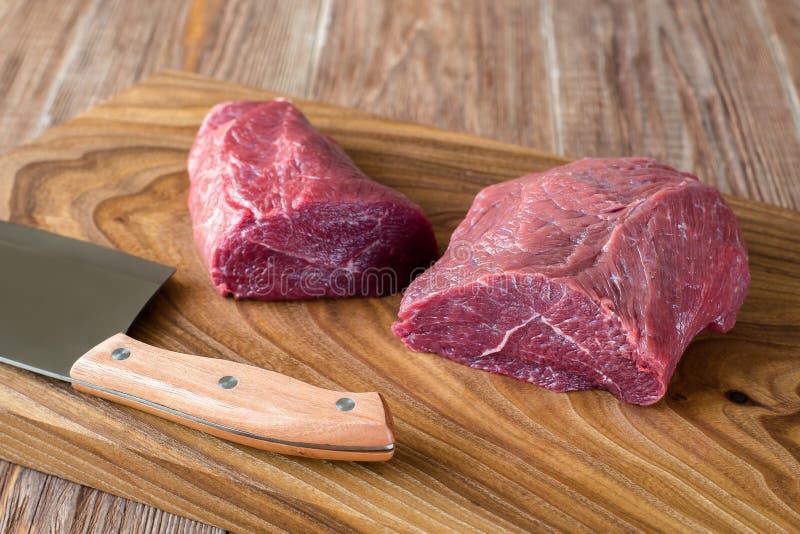 Fresh Raw Meat on Chopping Board. Two Peece of Beef Stock Image - Image ...