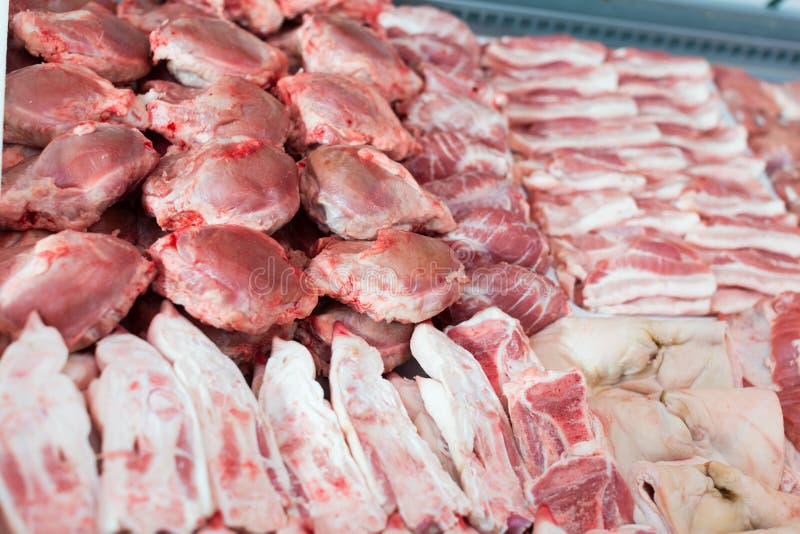 Fresh raw meat on display stock photo. Image of preparation - 238432288