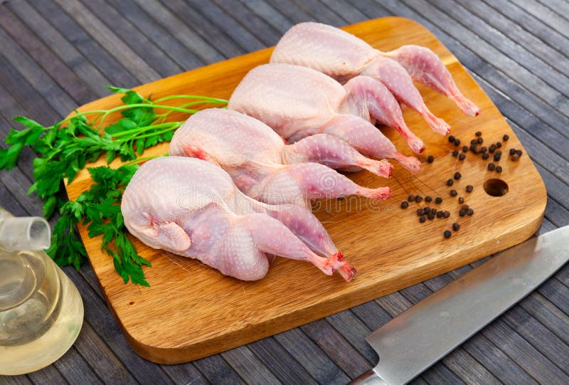 Fresh Raw Meat Quails Ready for Cooking on Slate Board Stock Photo ...