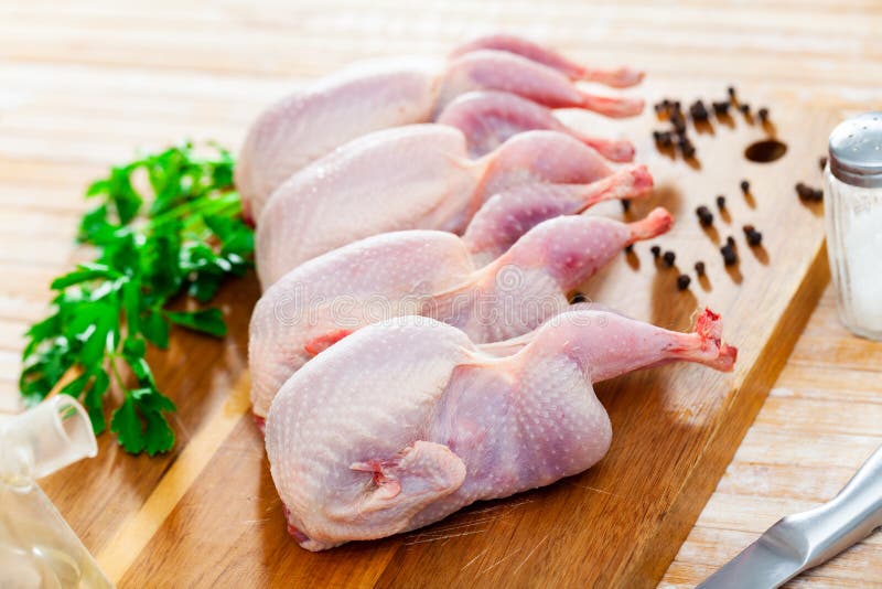 Fresh Raw Meat Quails Ready for Cooking on Slate Board Stock Photo ...