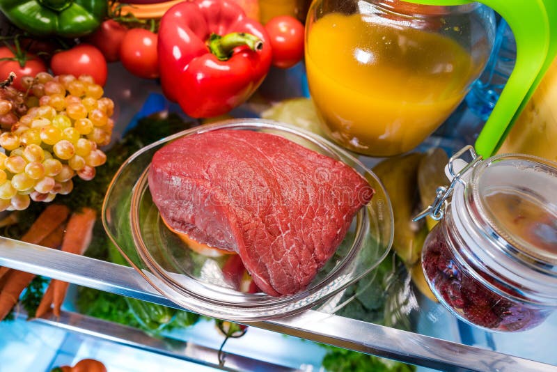 Fresh Raw Meat on a Shelf Open Refrigerator Stock Photo - Image of ...