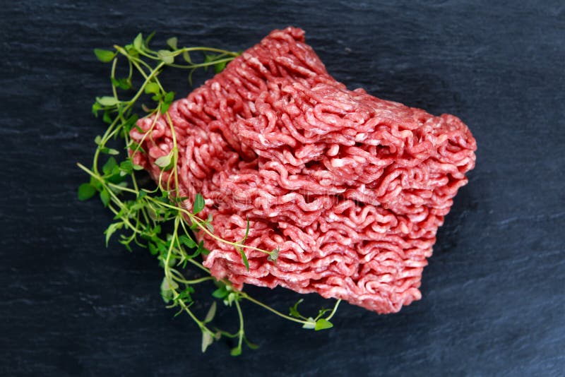 Fresh Raw Minced Beef on Old Blue Stone Background Stock Image - Image ...
