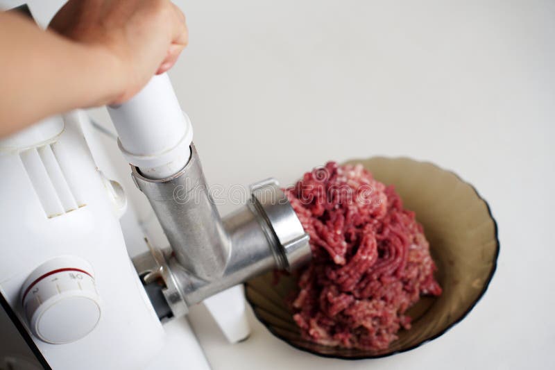 Fresh Raw Minced Meat in the Meat Grinder, Close-up Stock Photo - Image ...