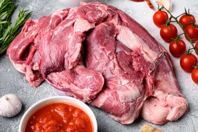 Fresh Raw Mutton Shoulder Meat, with Ingredients and Herbs, on Gray ...