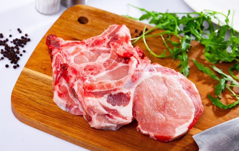 Fresh Raw Pork Loin Chops with Condiments Stock Photo - Image of ...